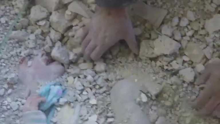 DRAMATIC: Video Shows Child Being Pulled Alive from Rubble After Syrian ... DRAMATIC: Video Shows Child Being Pulled Alive from Rubble After Syrian ...